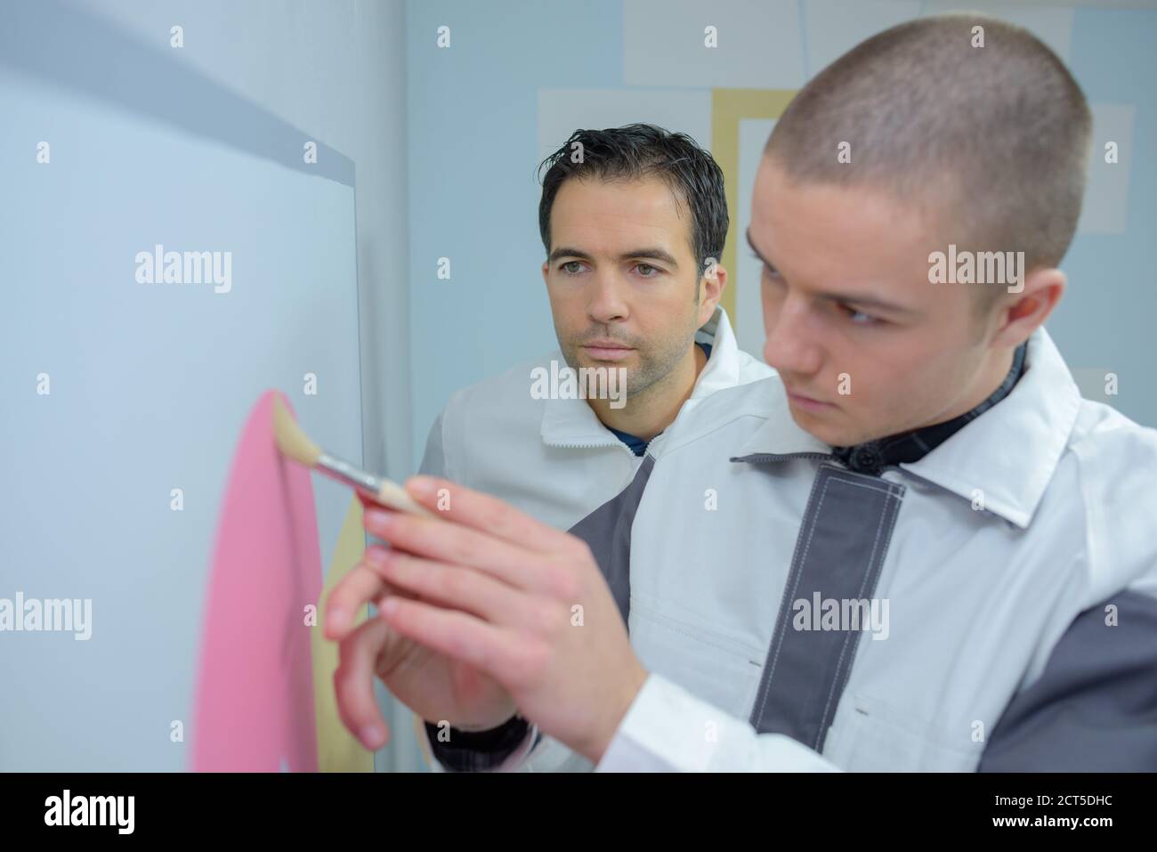 portrait of painter with apprentice Stock Photo - Alamy