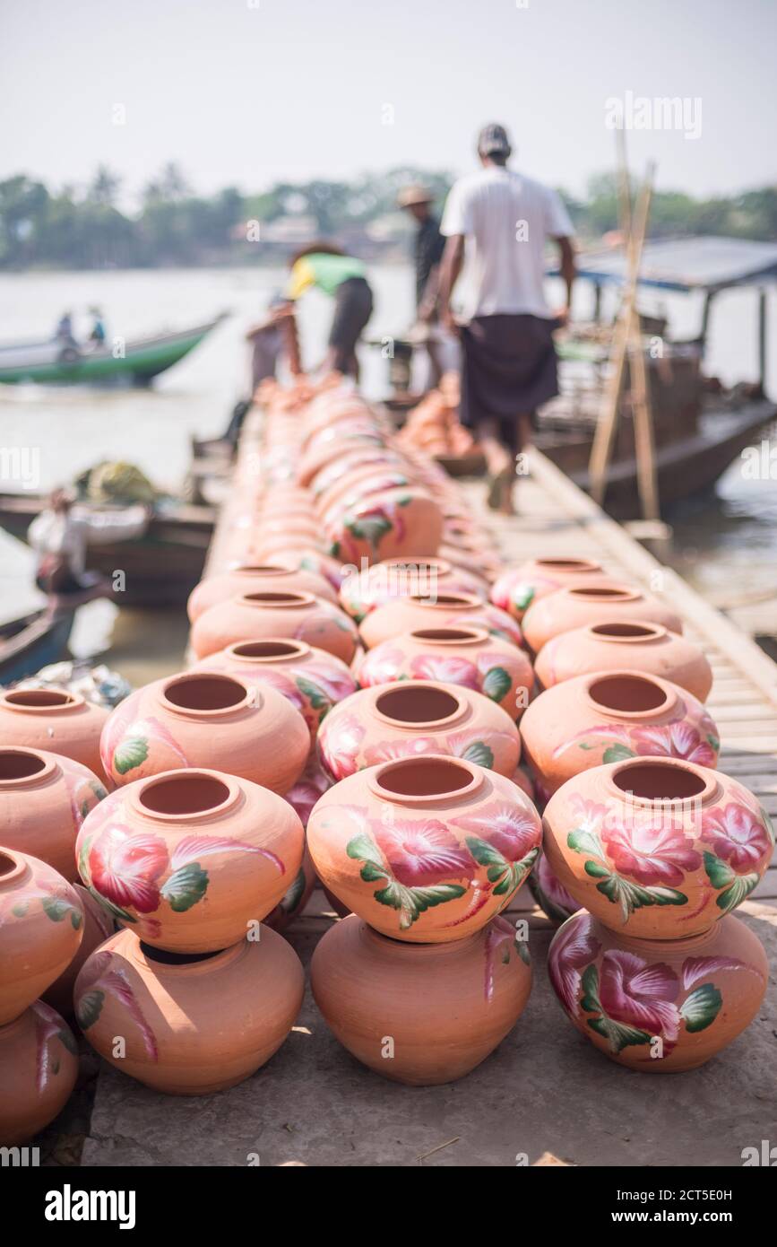 Pottery being loaded on to boats, Twante, near Yangon, Myanmar (Burma ...