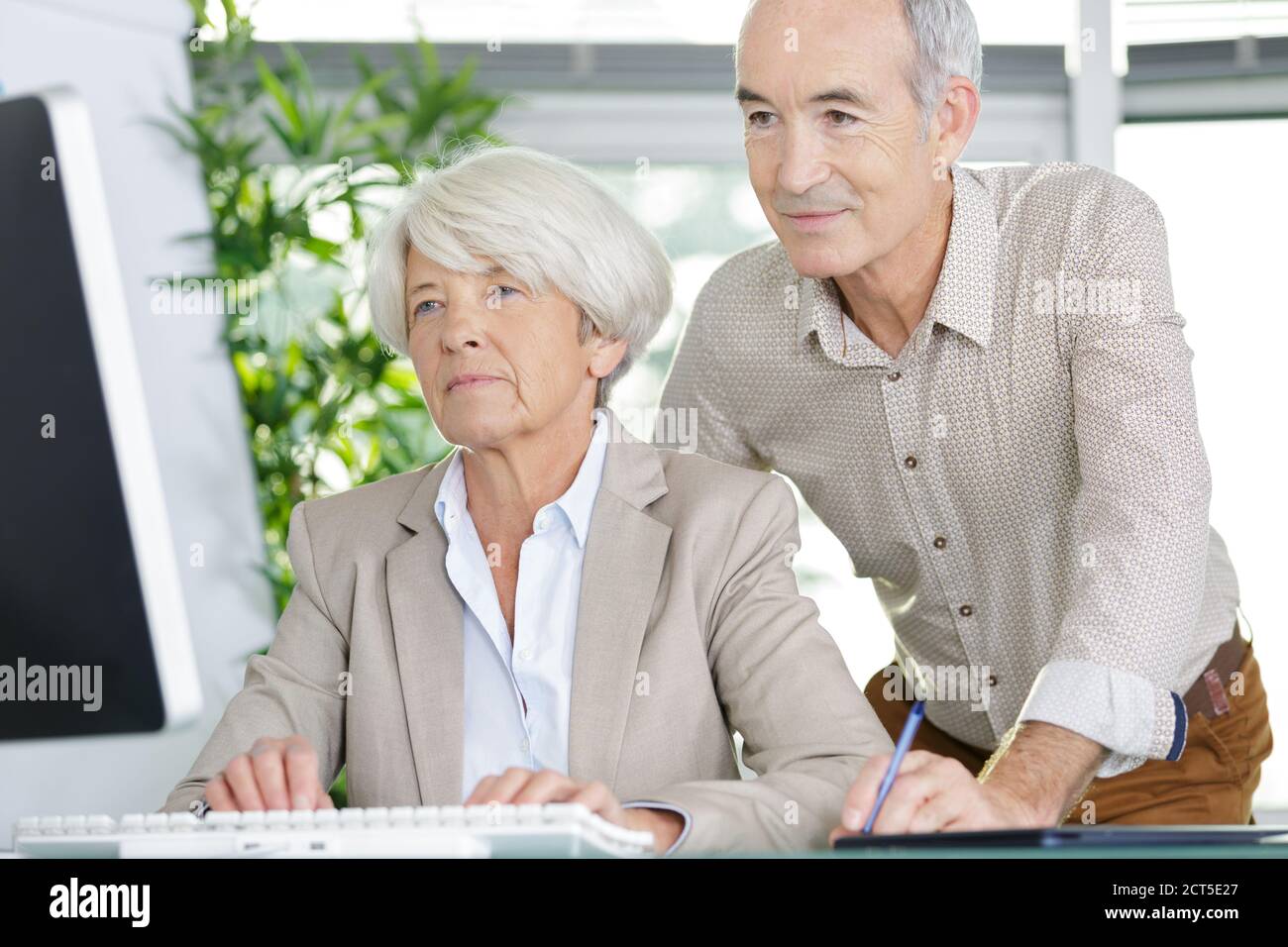 seniors learn in computer class about technology Stock Photo - Alamy