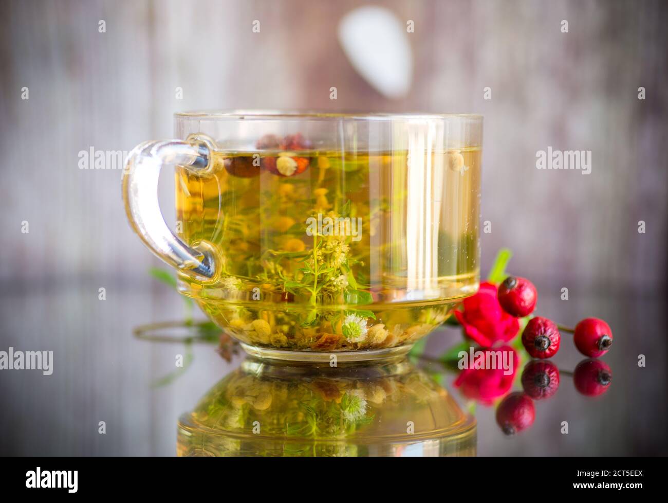 natural hot tea from various summer herbs in a glass cup Stock Photo ...