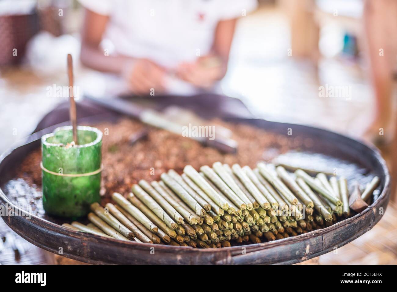 Rolling hand made cheroot cigars, a traditional Burmese cigar, Inle ...