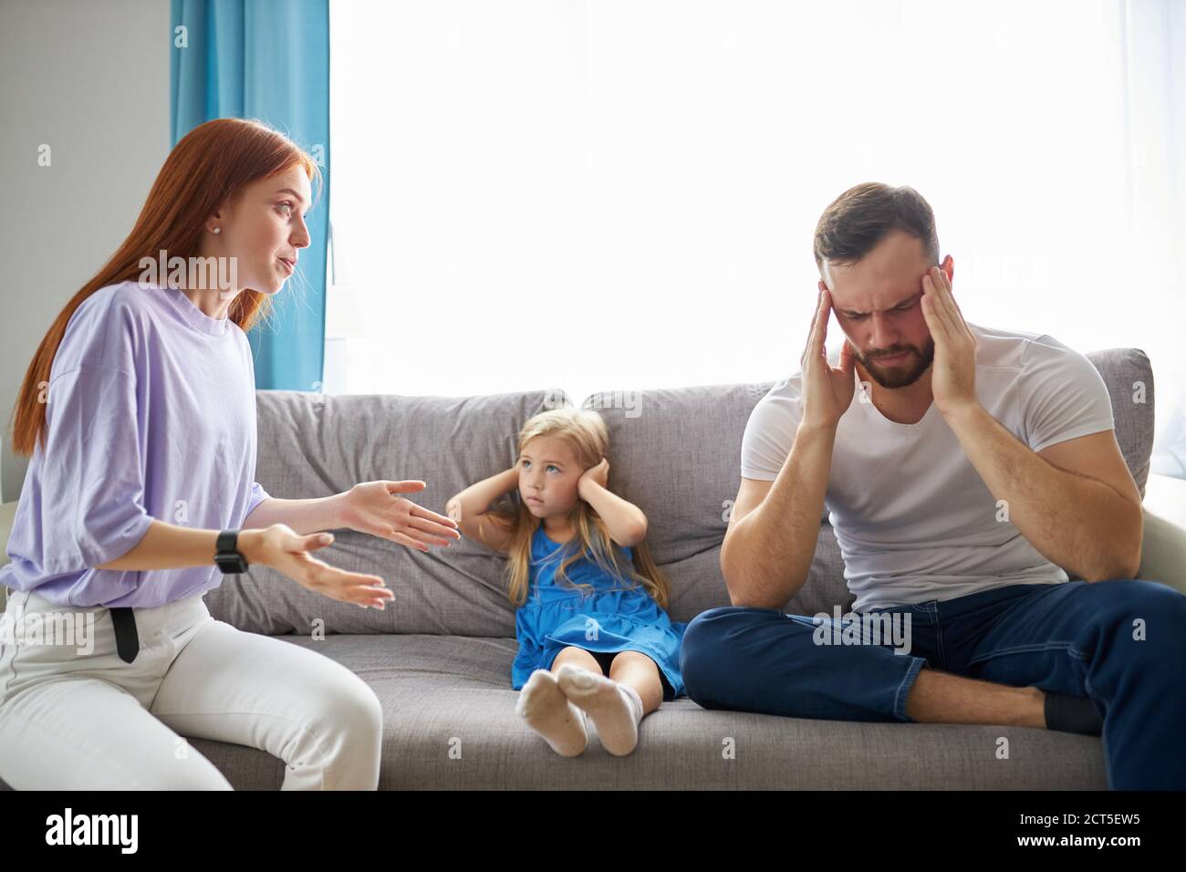 young caucasian parents argue at home, have quarrel, scream at each ...