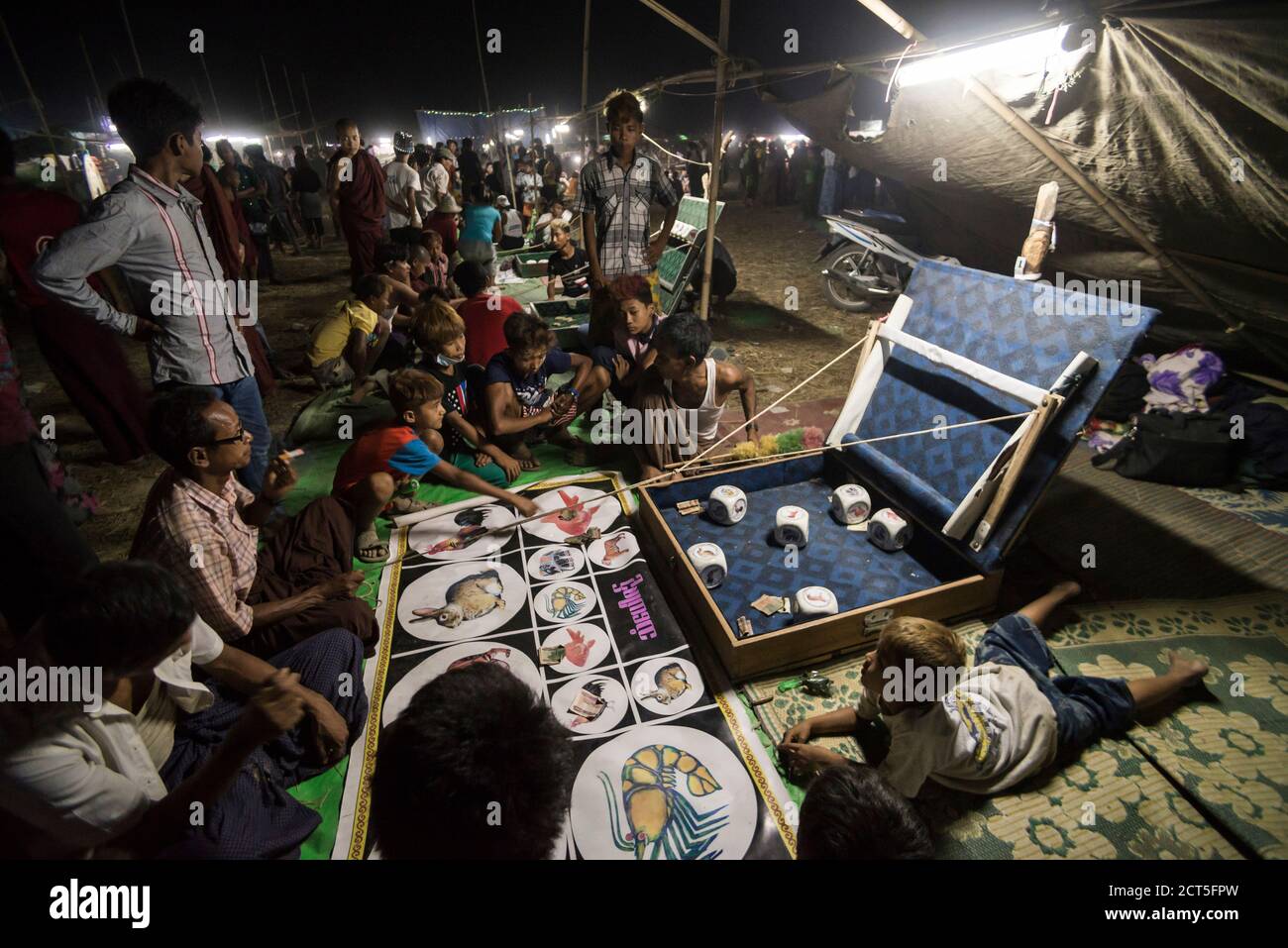 Mrauk U, gambling at Dung Bwe Festival for the passing of an important ...