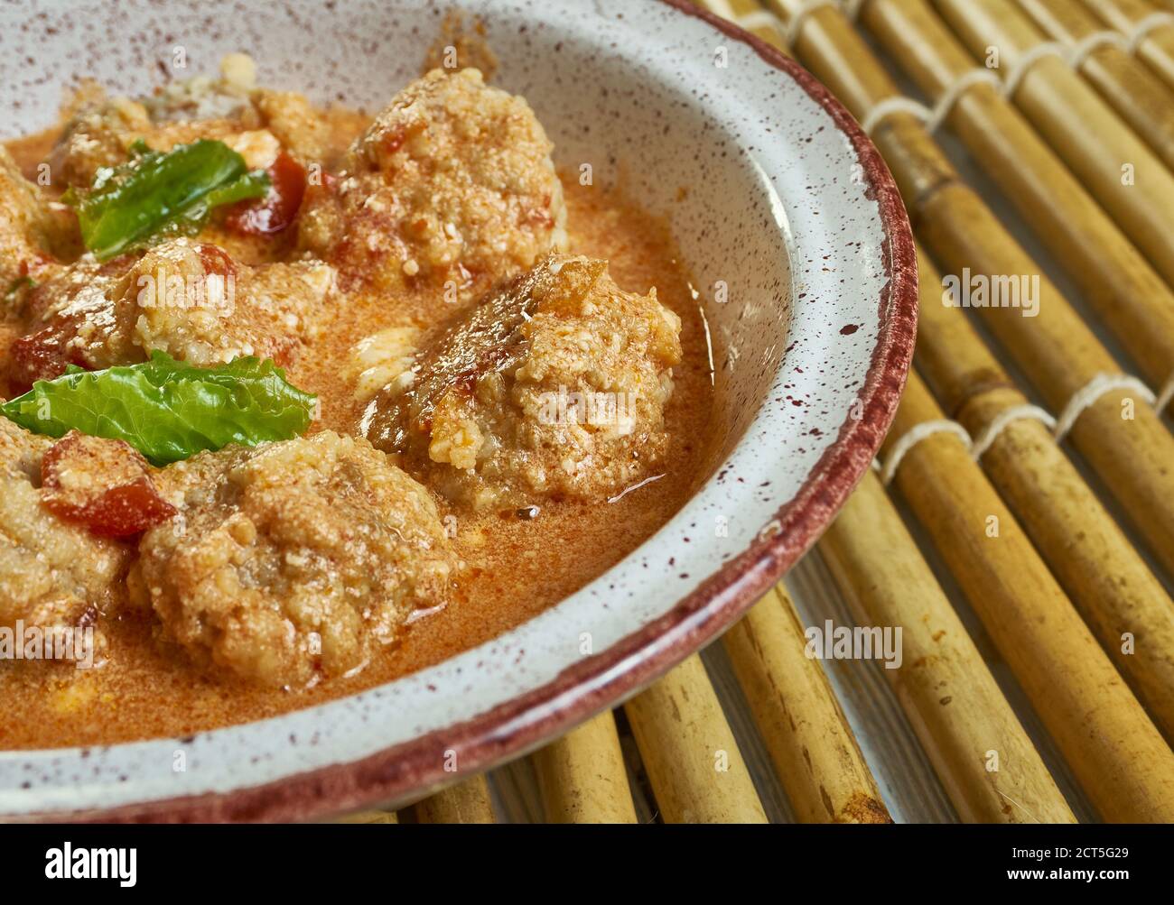 Sciusceddu - soup in Italian cuisine prepared using meatballs and ...