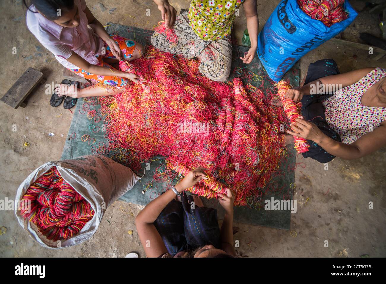 Making rubber bands on Bilugyun Island (aka Bilu Kyun or Ogre Island ...