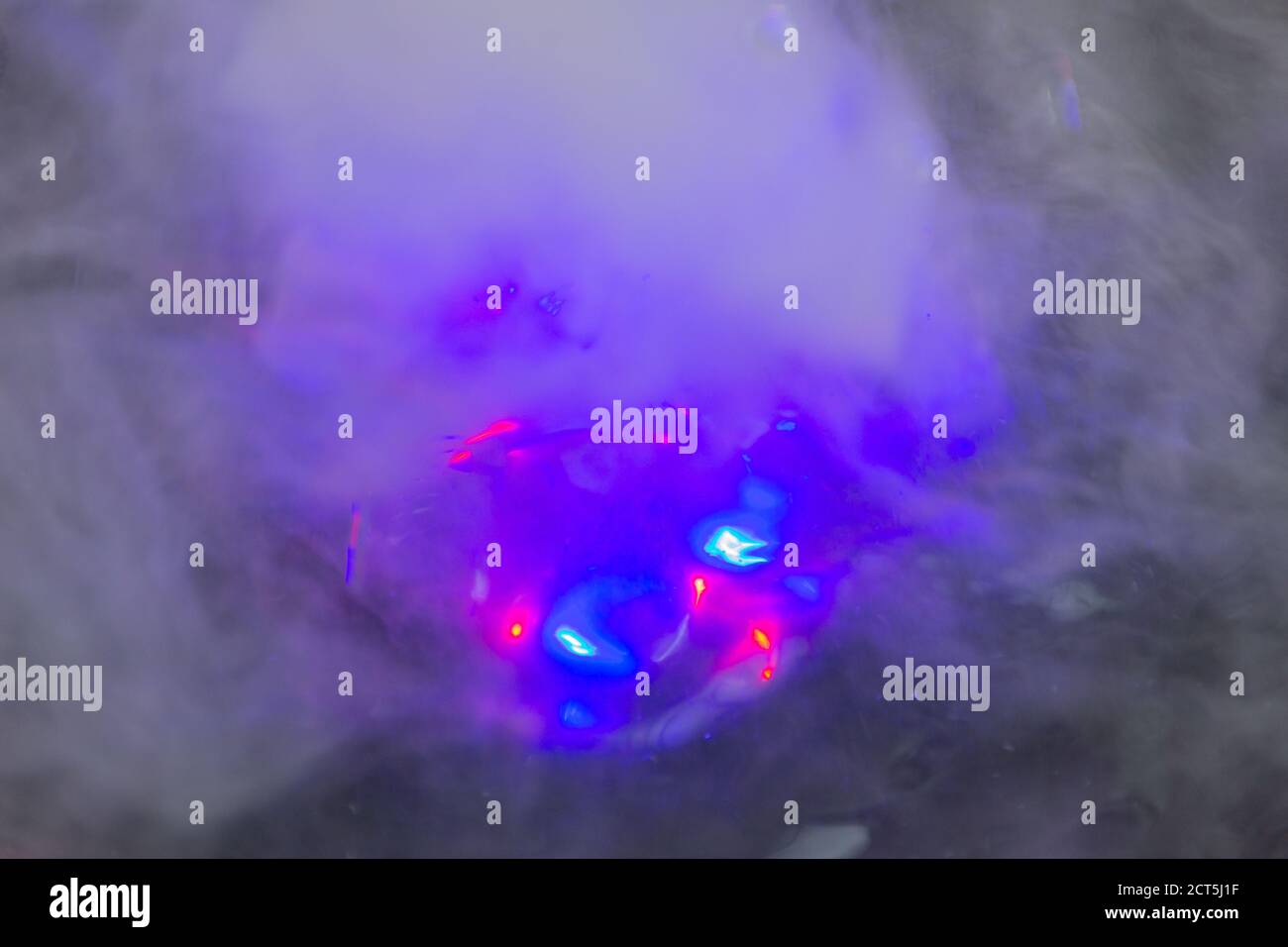 Colored smoke background made by a smoke machine Stock Photo - Alamy