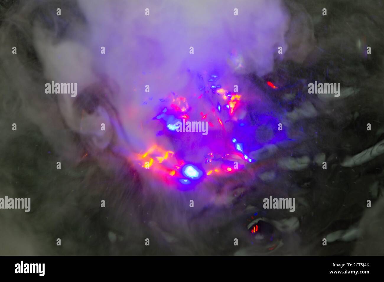 Colored smoke background made by a smoke machine Stock Photo - Alamy