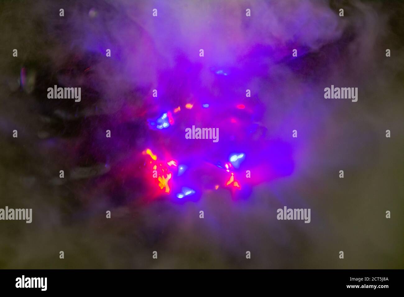 Colored smoke background made by a smoke machine Stock Photo - Alamy