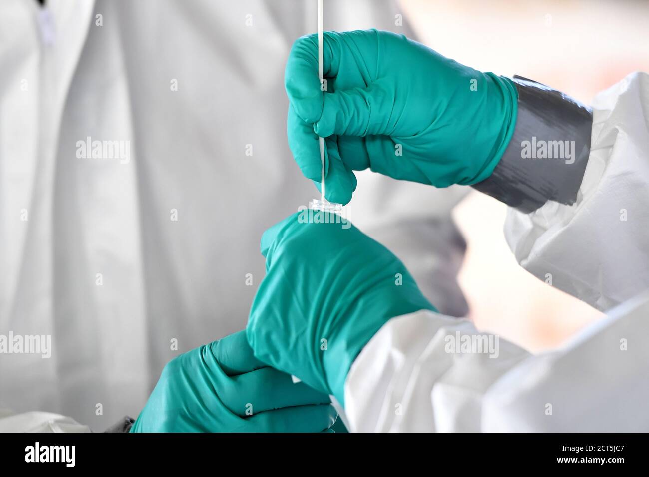 Munich, Germany. 21st Sep, 2020. Topic picture Corona PCR test. Cotton ...