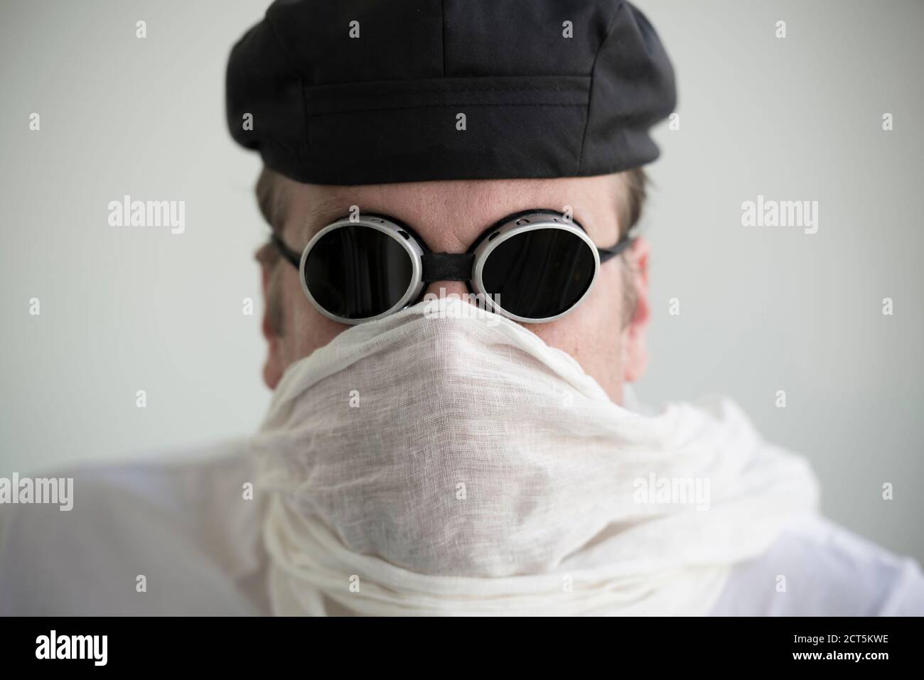 Man covering face scarf hi-res stock photography and images - Alamy