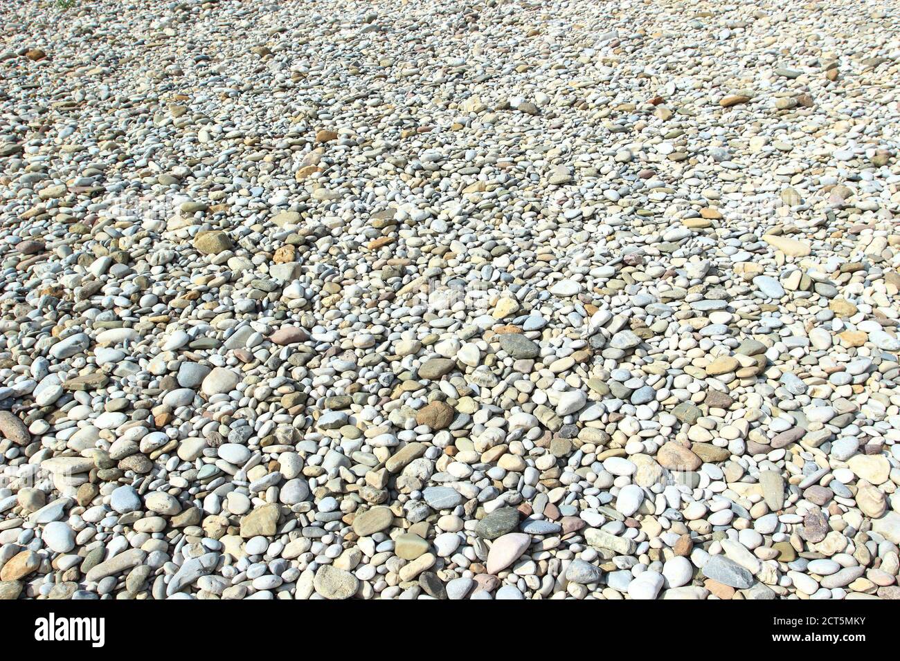 Colorful rounded rocks, pebbles on the river coast Stock Photo - Alamy
