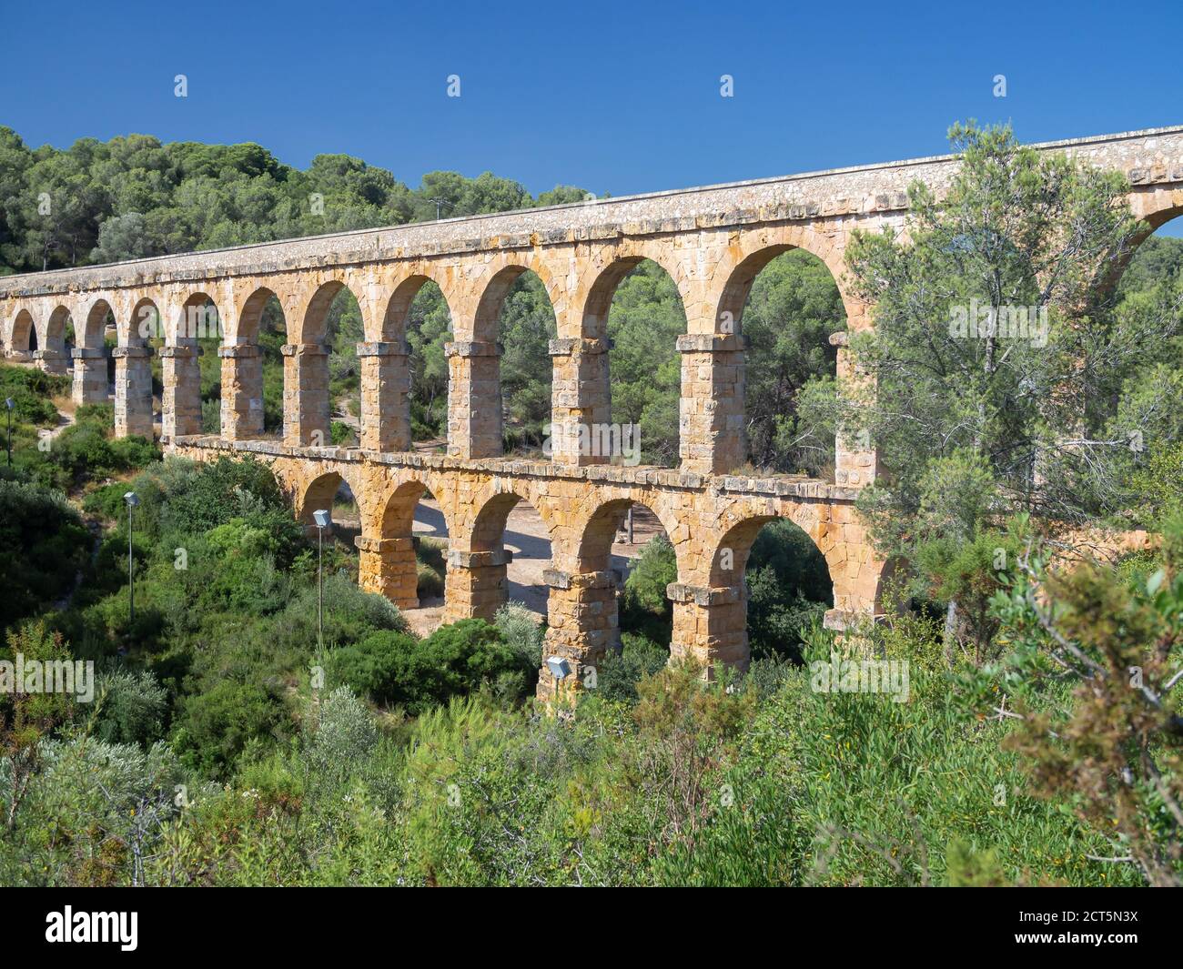 Antique Roman aqueduct known as El Pont del Diable (The devil's bridge), Tarragona, Catalonia ...