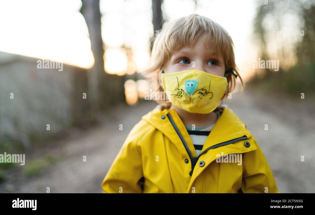 Kid happy mask outdoors hi-res stock photography and images - Alamy