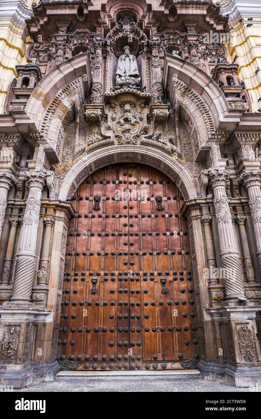 Large wooden church doors in historic centre of Lima, Lima Province ...