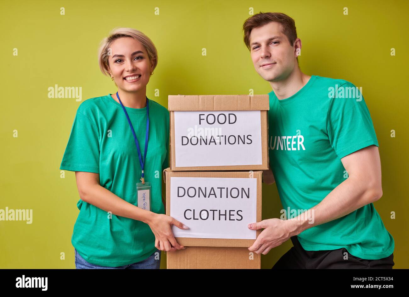 kind altruistic caucasian friends help poor people, collect donation ...