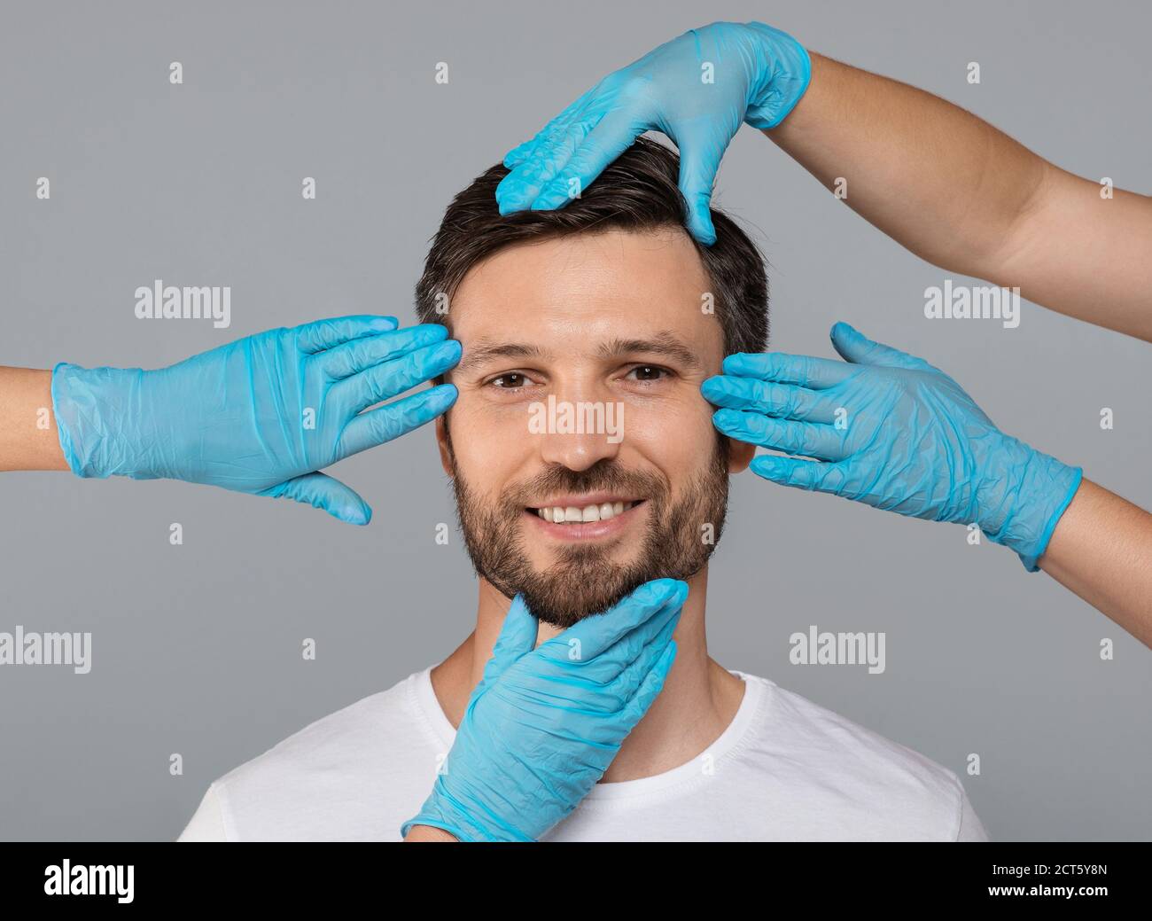 Smiling man face hi-res stock photography and images - Alamy