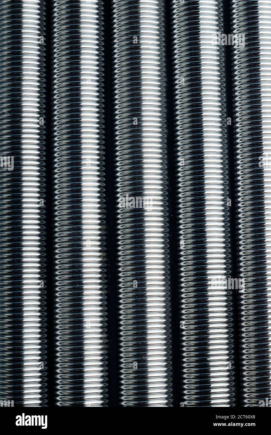 Seamless background of vertical rows of metal coil springs Stock Photo ...