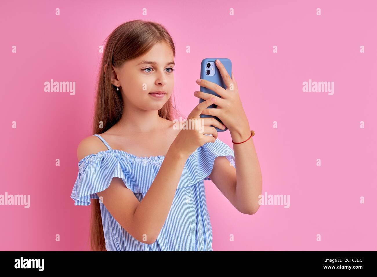 adorable caucasian teen girl use smartphone, chatting with friend ...