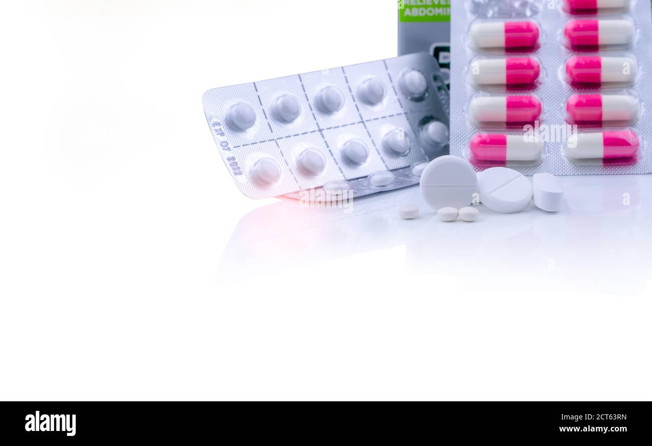Pink ibuprofen pills on white hi-res stock photography and images - Alamy
