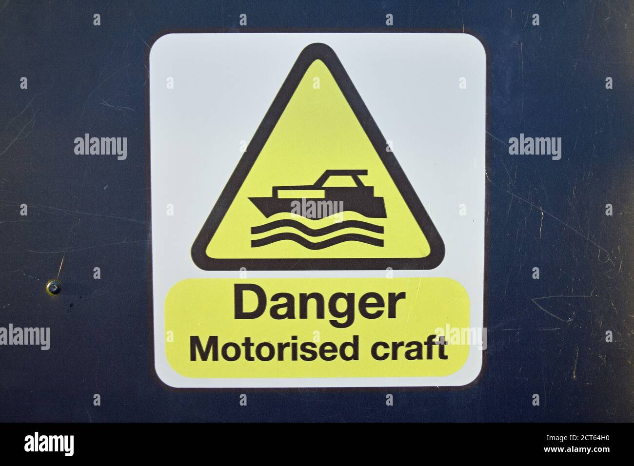 Danger motorised craft sign with icon of boat on waves in warning ...