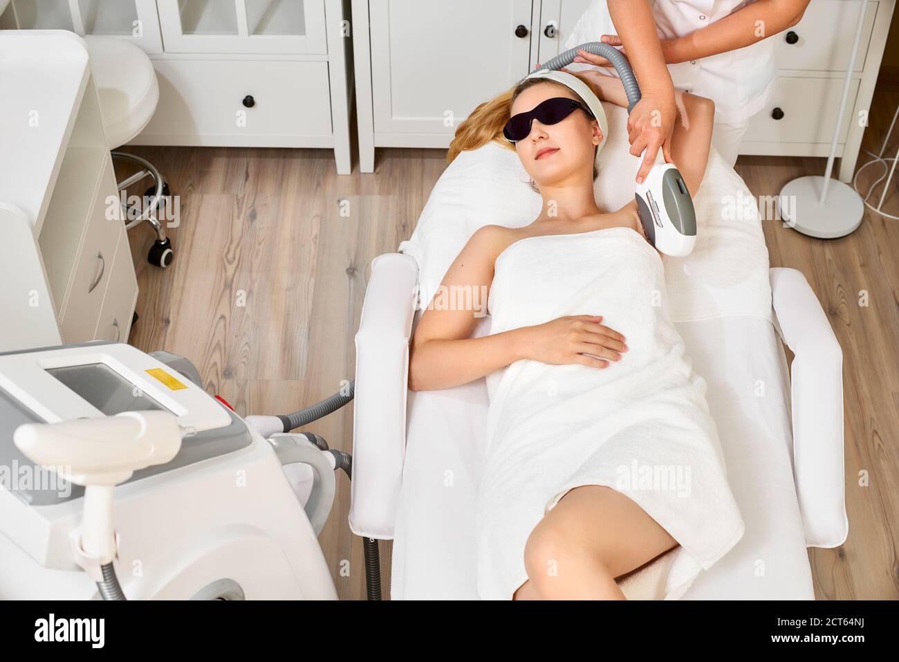 Smooth skin under the arms. Woman on laser hair removal Stock Photo - Alamy