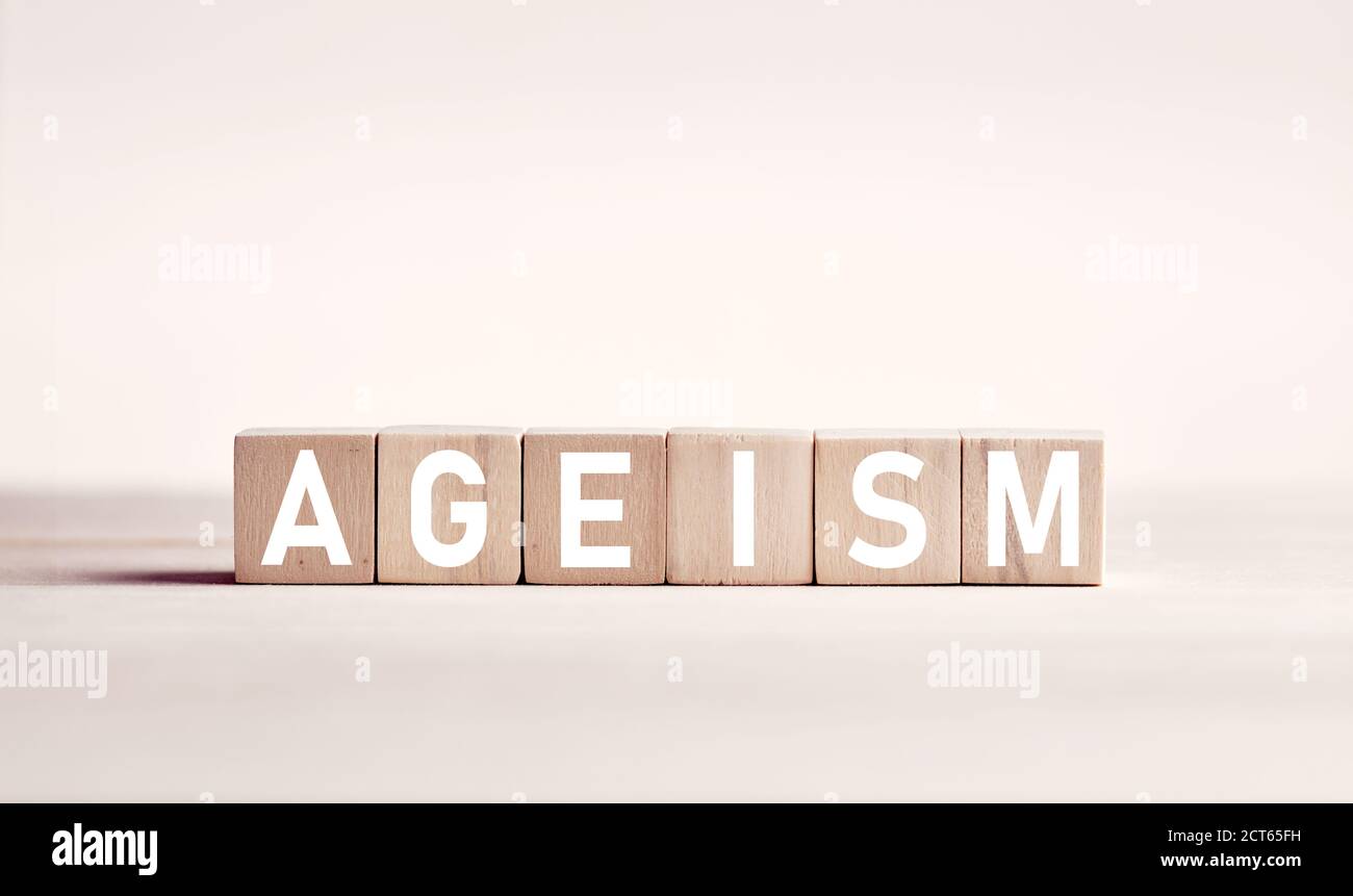 The word ageism on wooden blocks against white background. Age ...