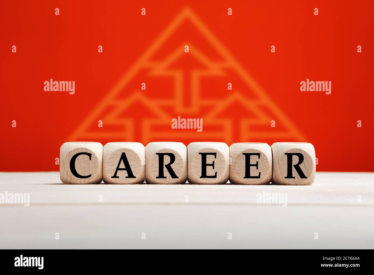 The word career on wooden blocks with promotion hierarchy triangle ...