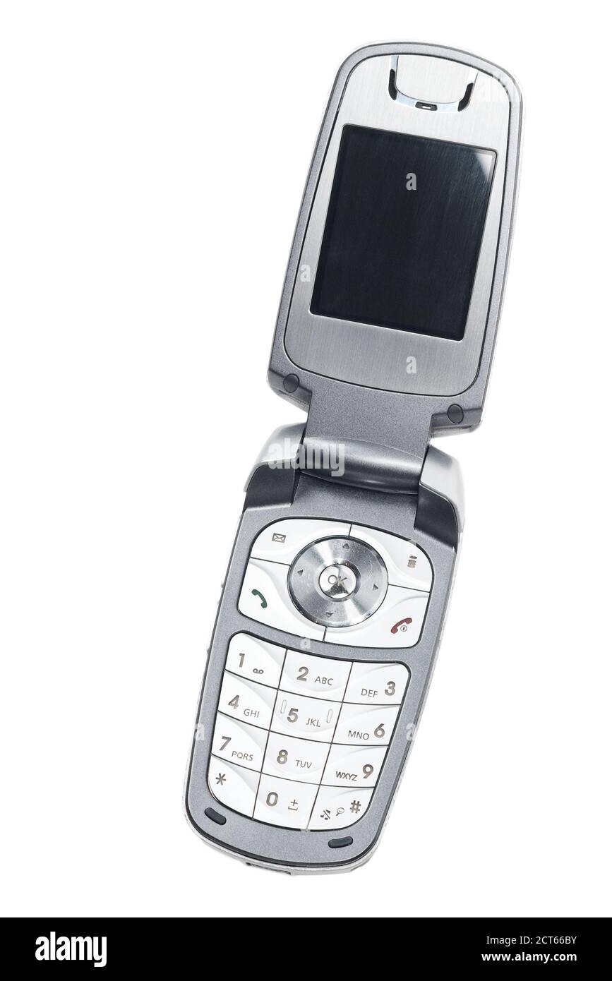 Used silver clamshell cellular mobile telephone on a white background ...