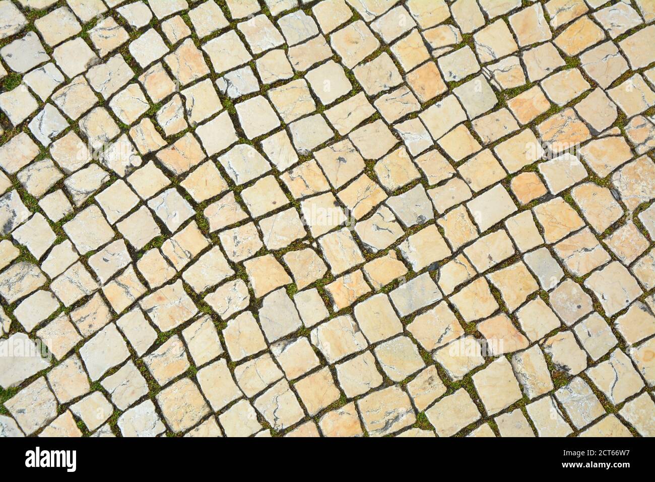 Typical Lisbon pavement made of limestone squares background Stock ...