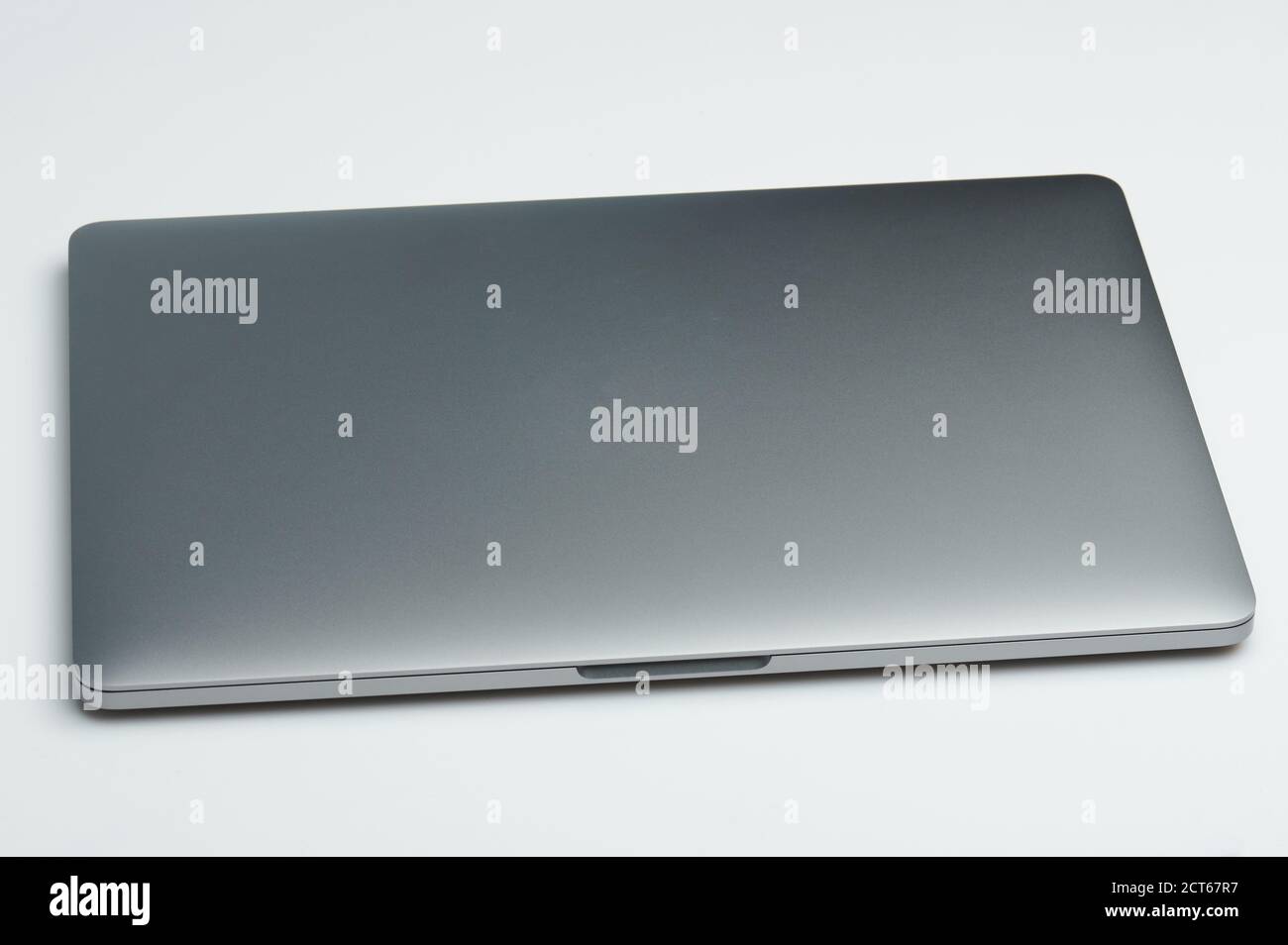 Gray closed metal laptop isolated on white studio background Stock ...