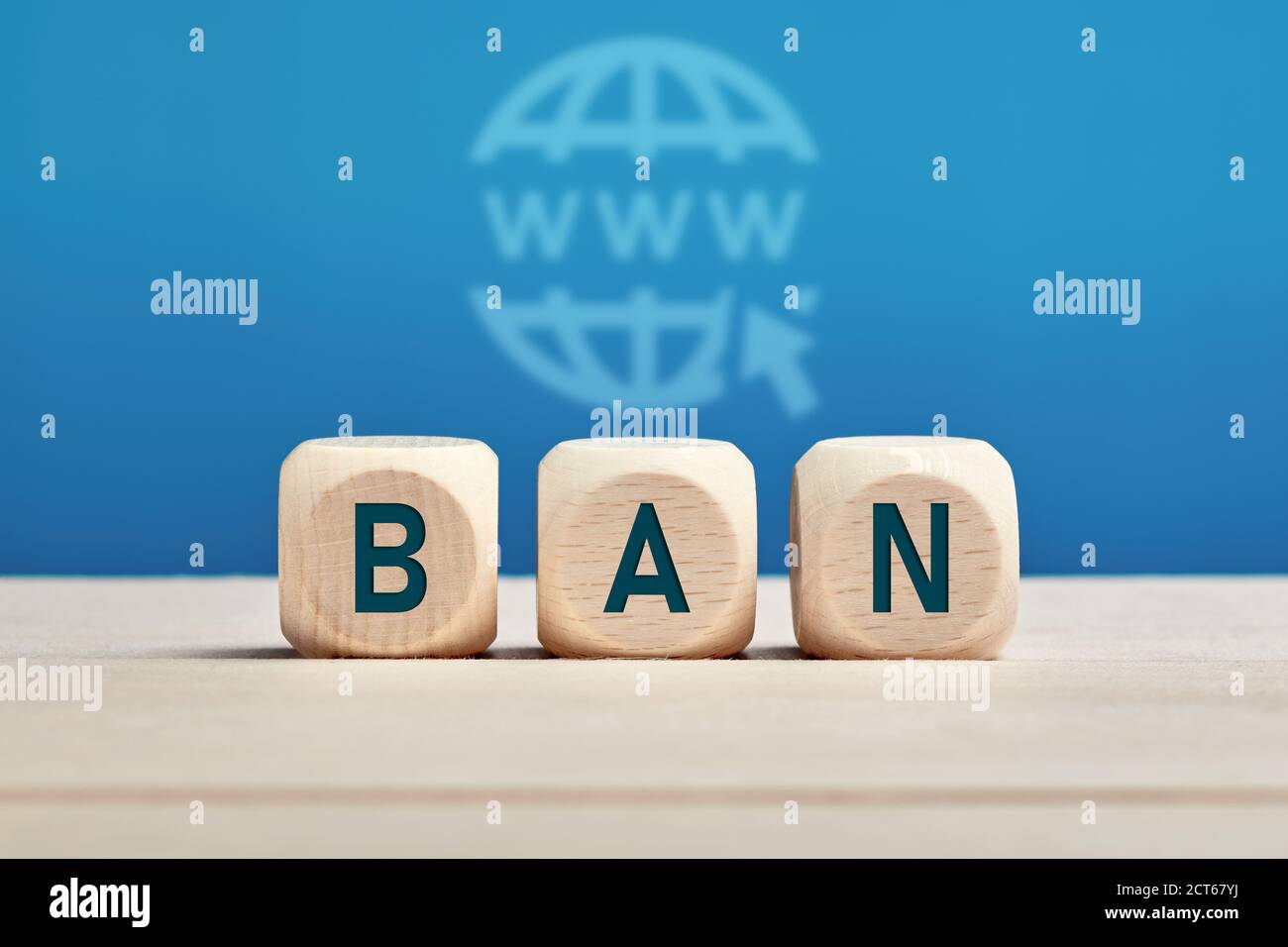 The word ban on wooden cubes against internet www icon background ...