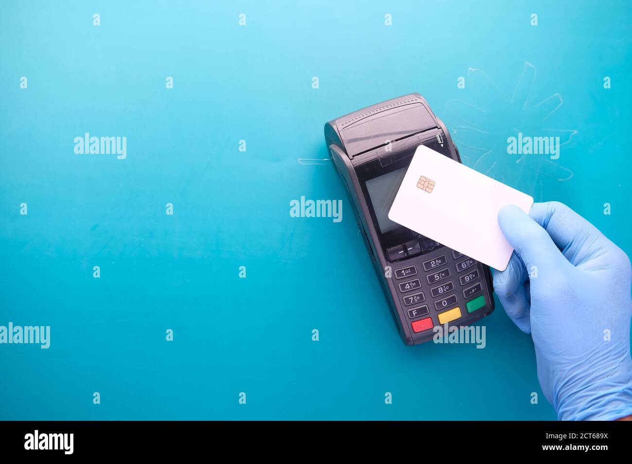 Payment terminal charging from a card, contactless payment Stock Photo ...