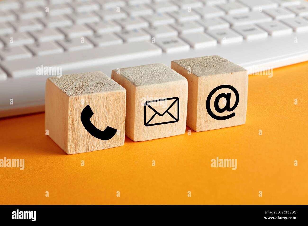 Online business communication symbols of telephone, email and mail ...