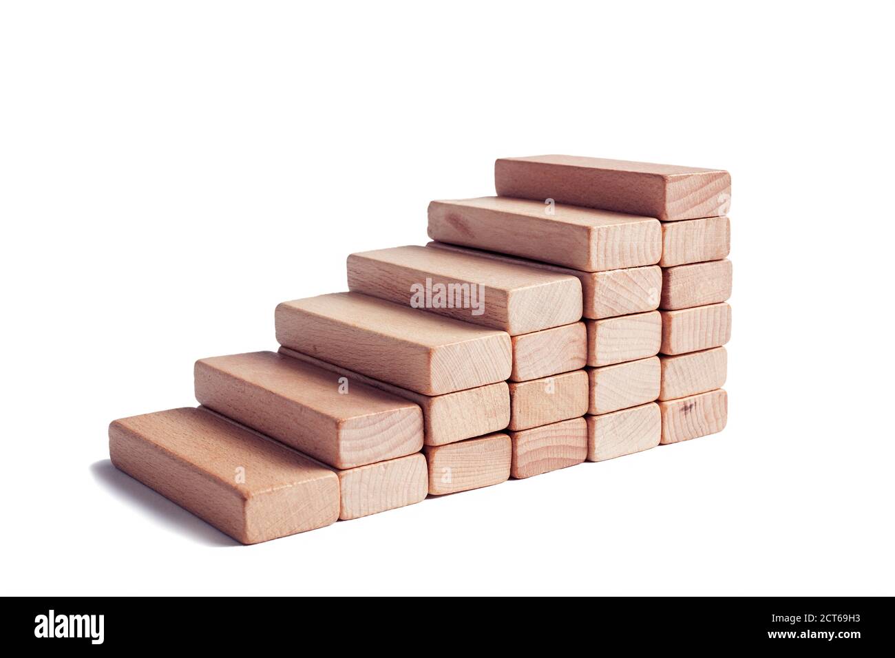 Stairs build with wooden blocks on isolated white background. Stairs to ...