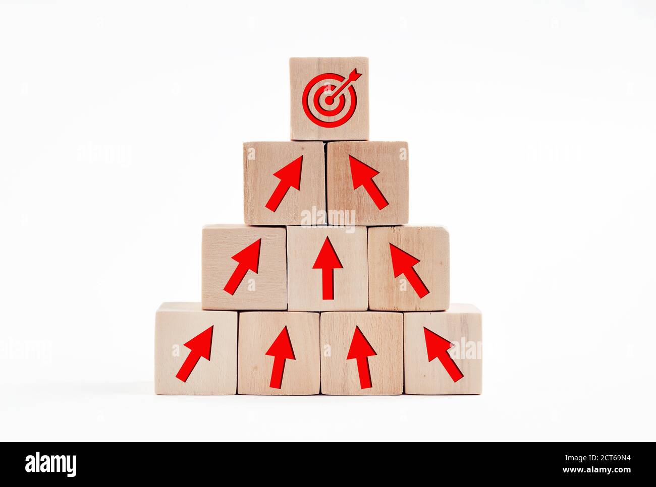 Arrow icons and target icon on wooden cubes. Financial growth, goal ...