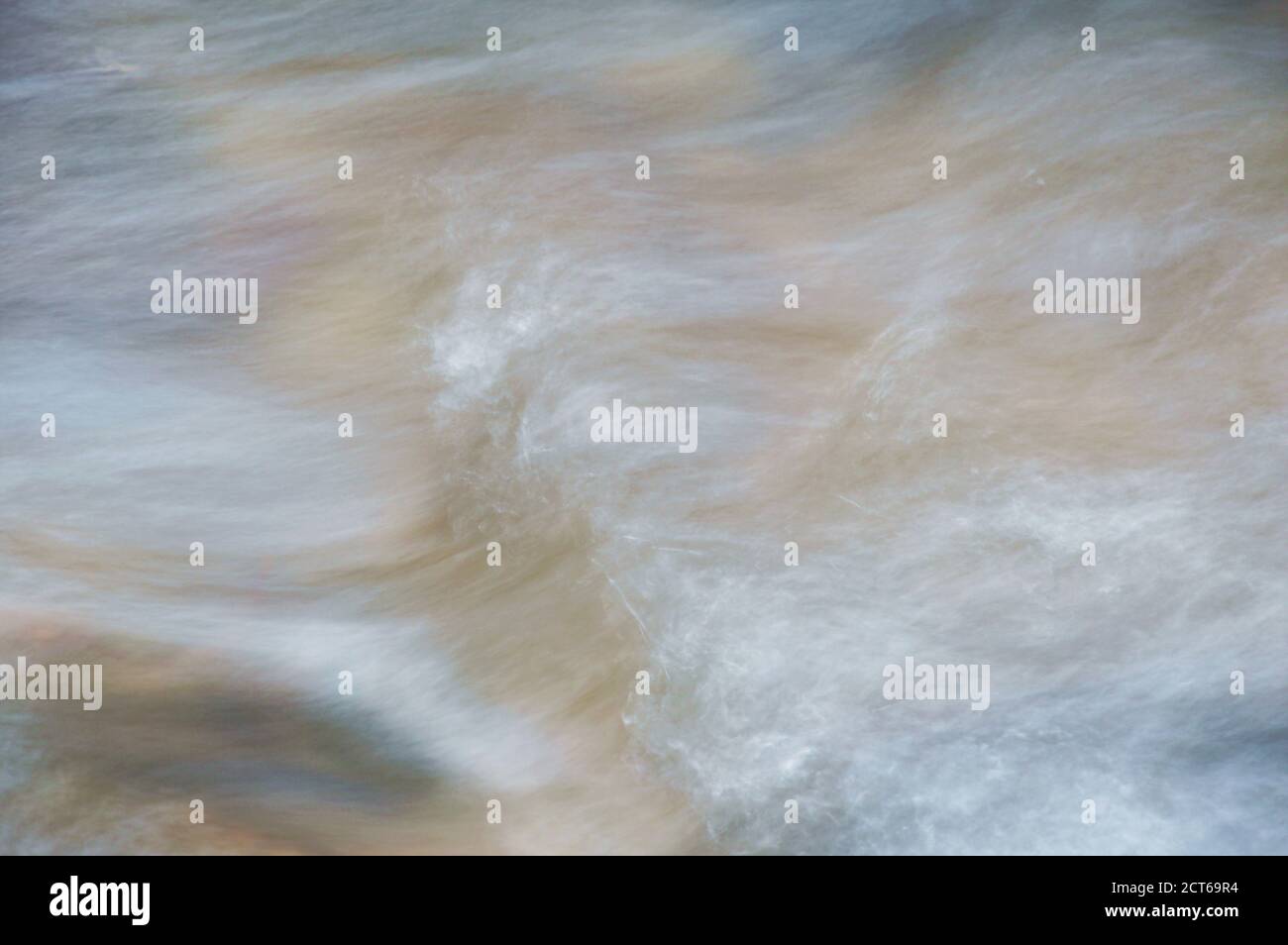 Blurry water flowing on the rock and wave splashing in river Stock ...