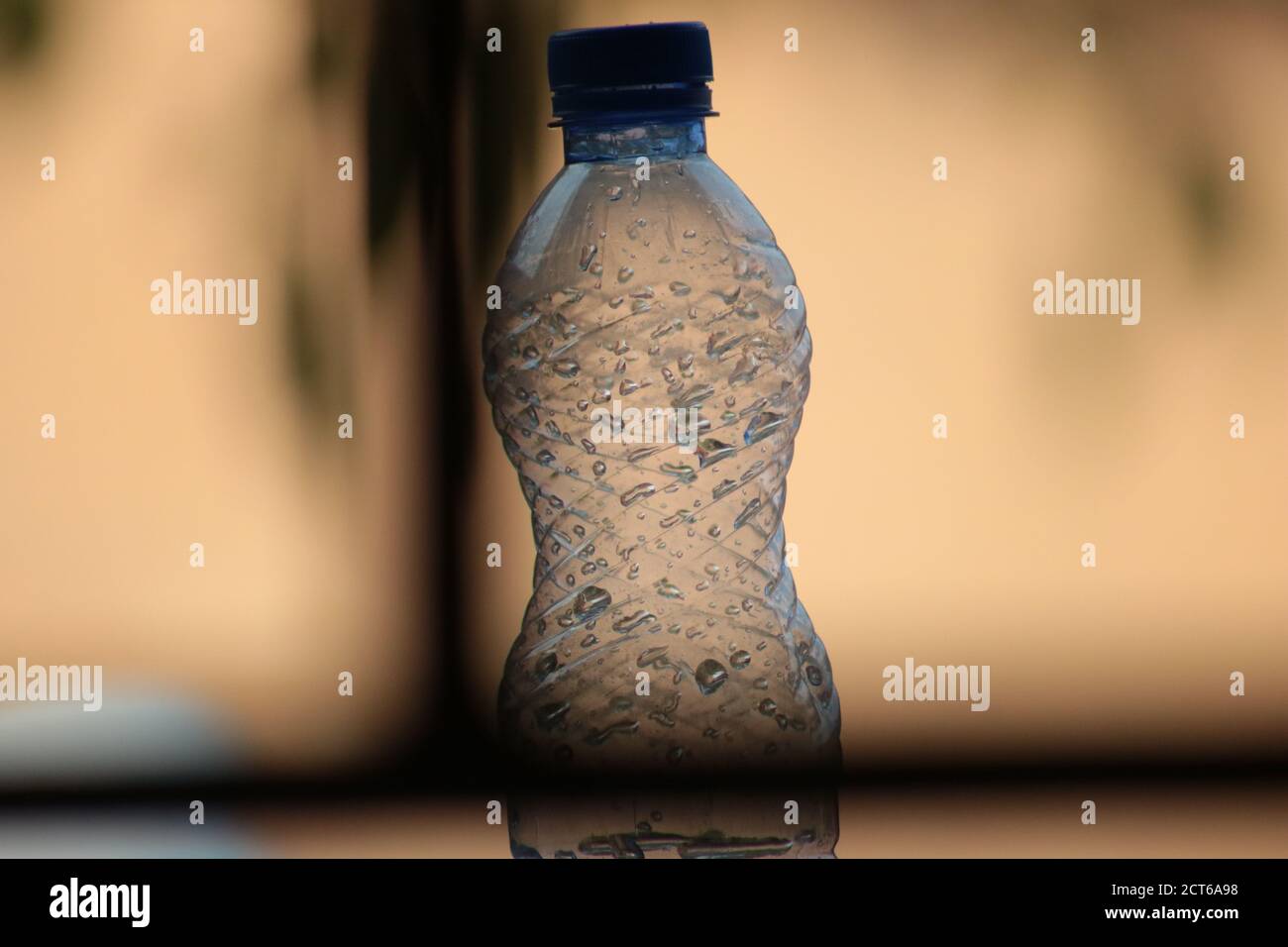 little drops in empty bottle Stock Photo - Alamy