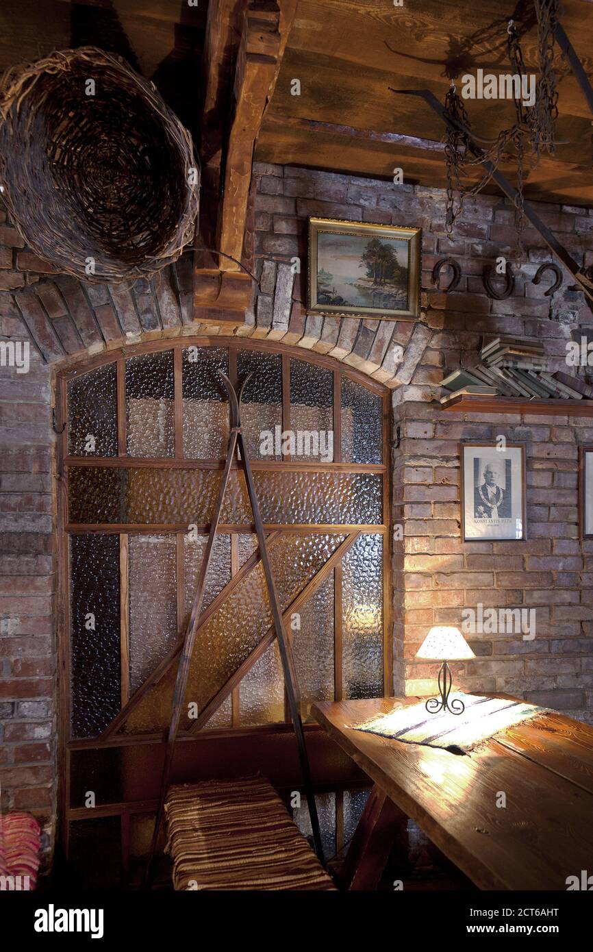 A hotel with old fashioned retro styled rooms, and rustic objects ...