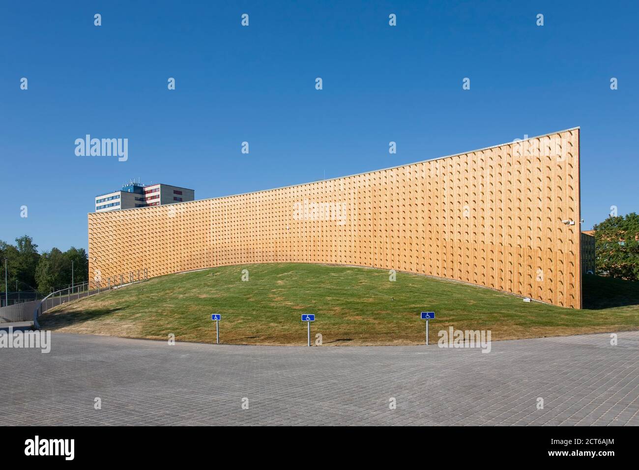 Modern university buildings, wooden beams projecting from a curved wood ...