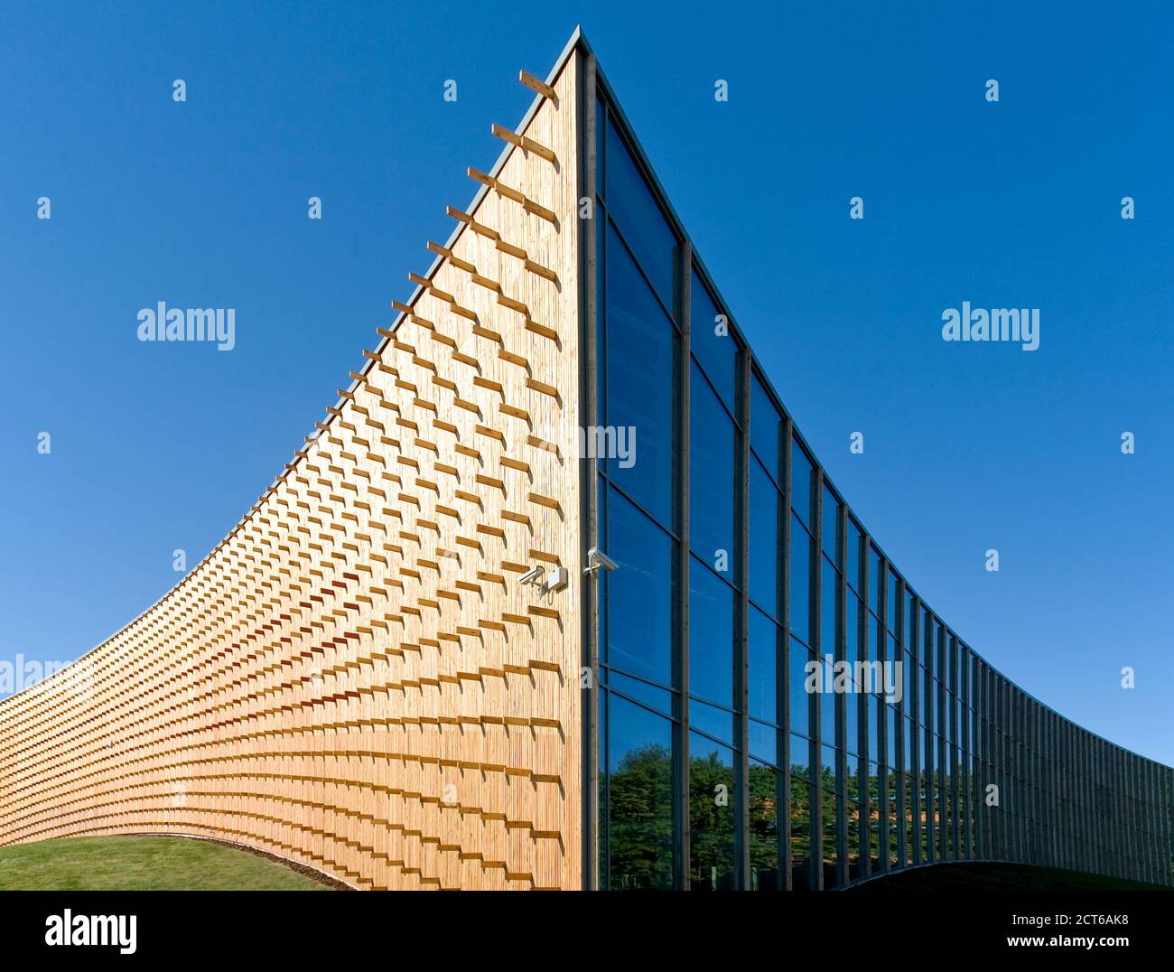 Modern university buildings, wooden beams projecting from a curved wood ...