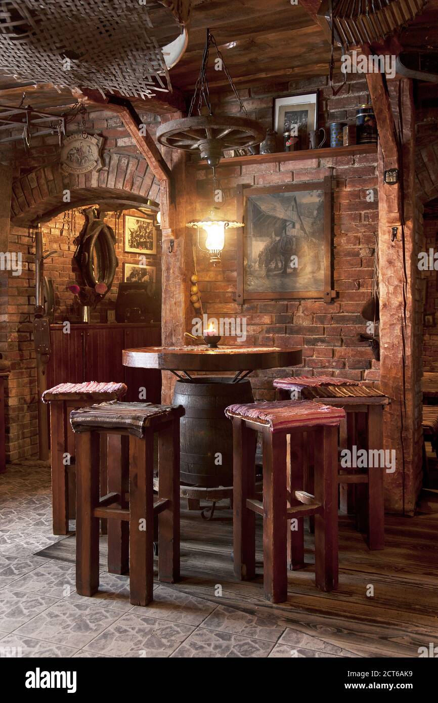 A hotel with old fashioned retro styled rooms, and rustic objects, bar ...