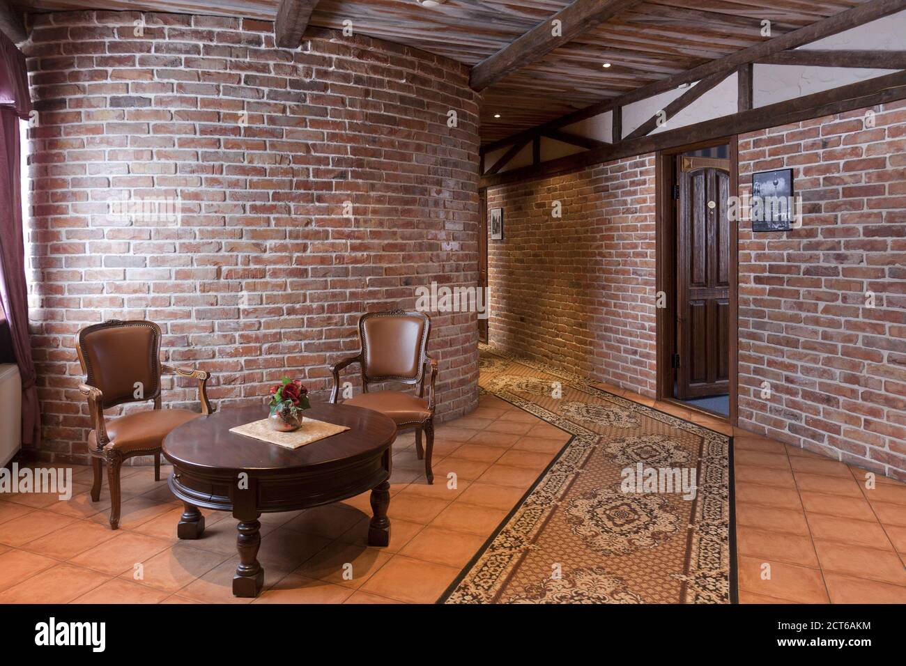 A hotel with old fashioned retro styled rooms, and rustic objects ...