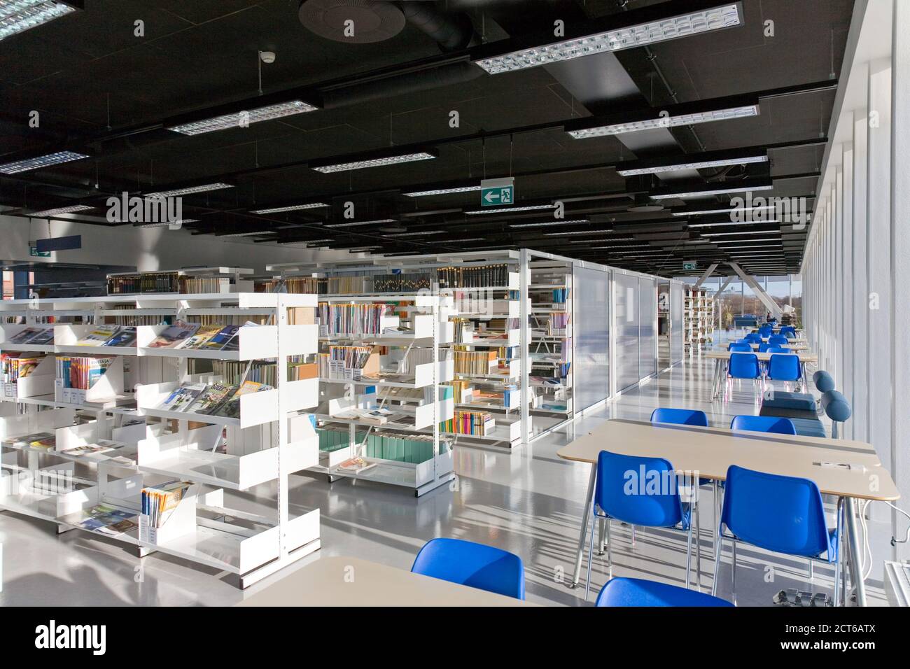 Public Library Interior, modern building with book shelves Stock Photo ...