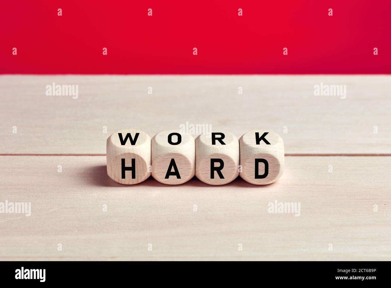 Work hard concept or message on wooden cubes Stock Photo - Alamy