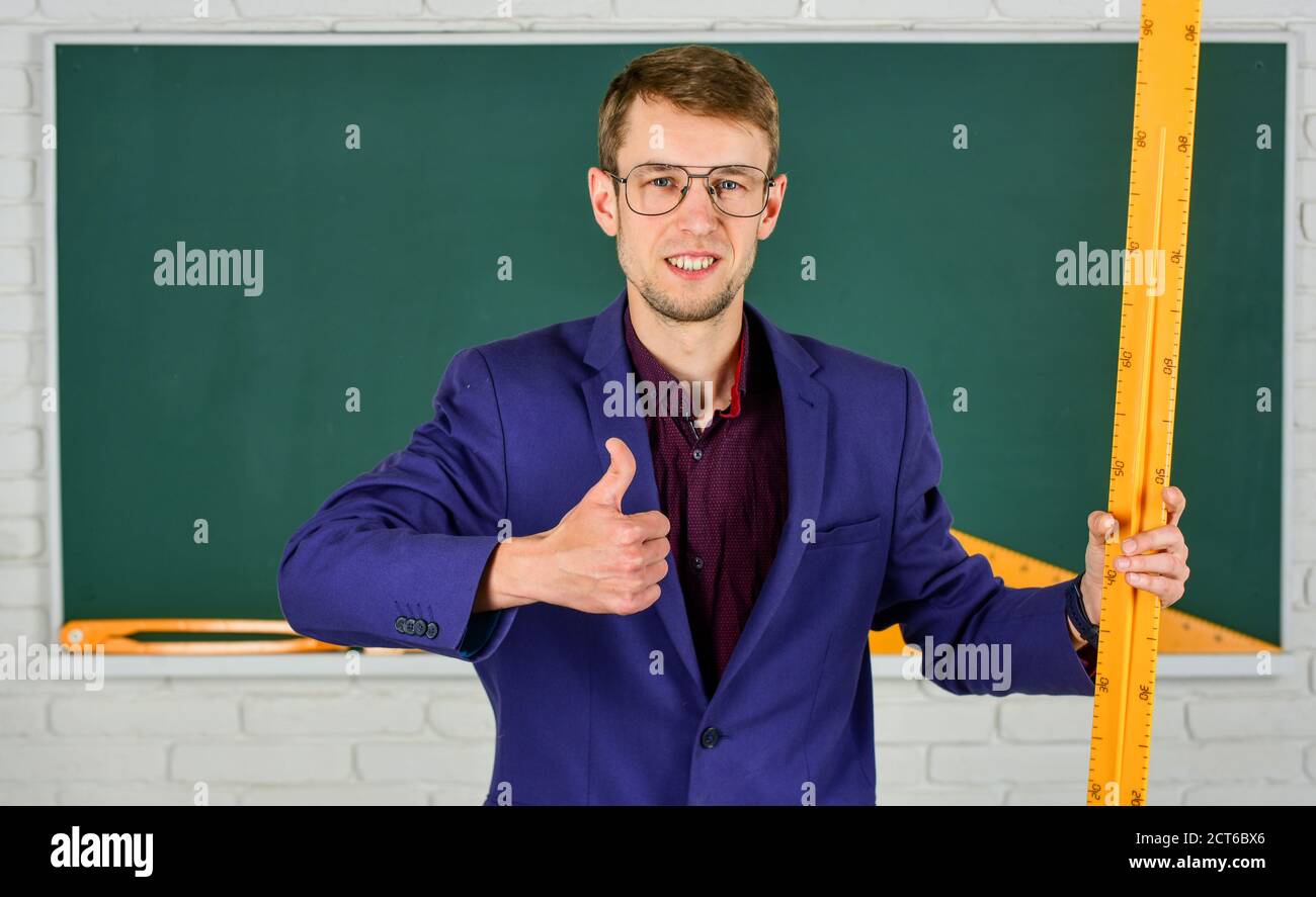 mathematics and people concept. man at blackboard. back to school ...