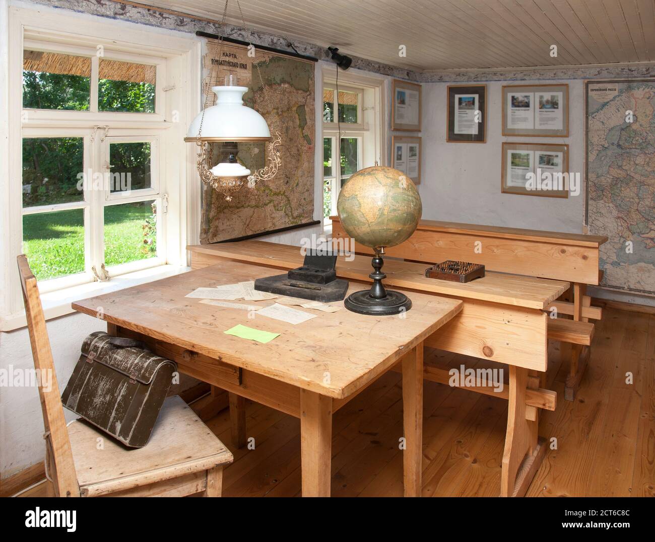 Old Fashioned Classroom in a school house, desks and oil lamps Stock ...