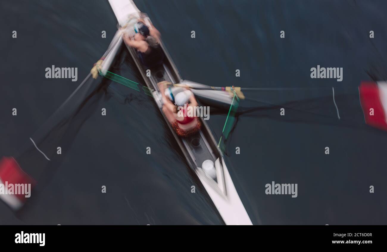 Overhead view of two people rowing in a scull, a pair in a boat Stock ...