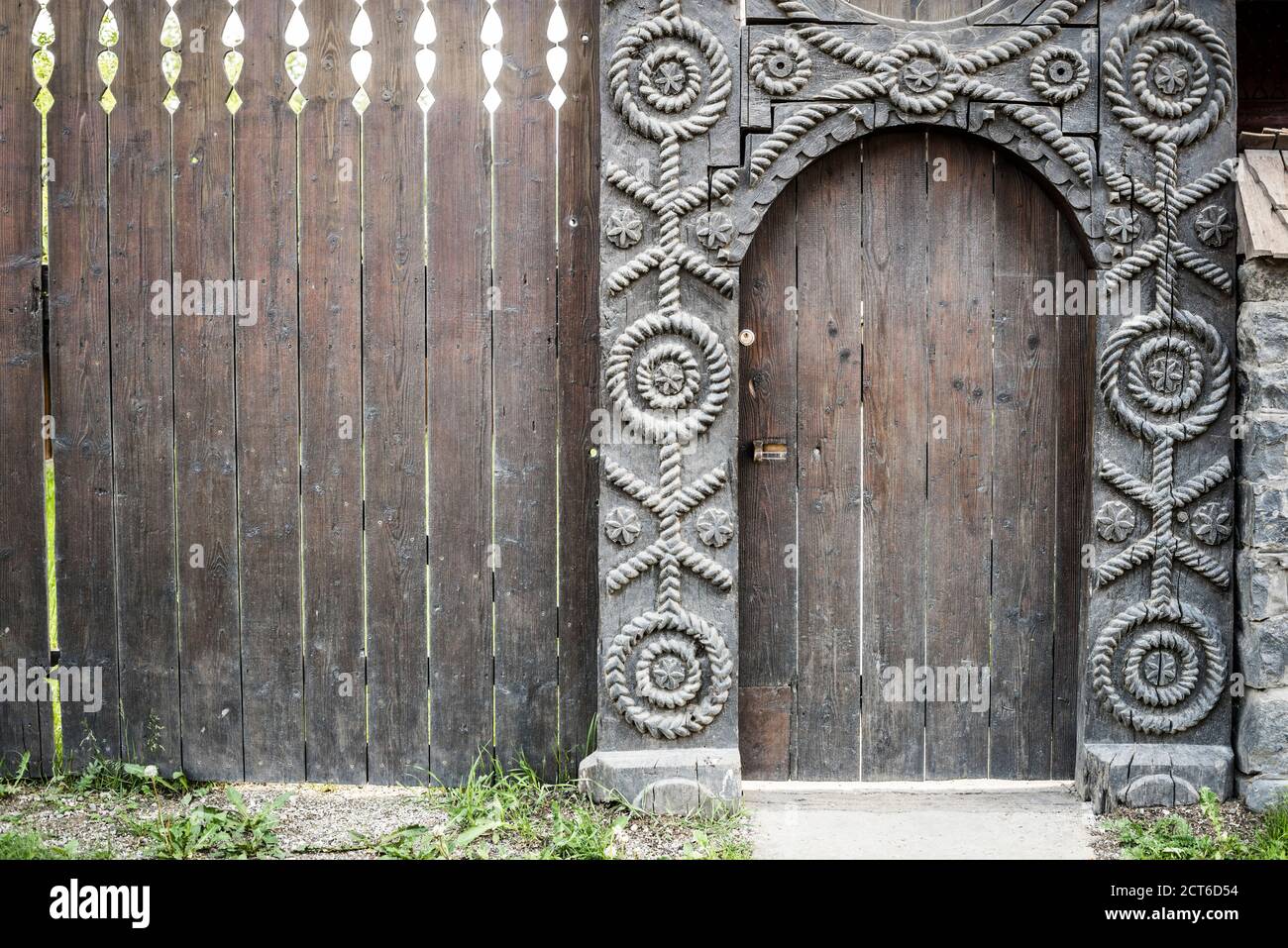 Traditional Romanian wooden decorated gate, found in the Maramures and ...