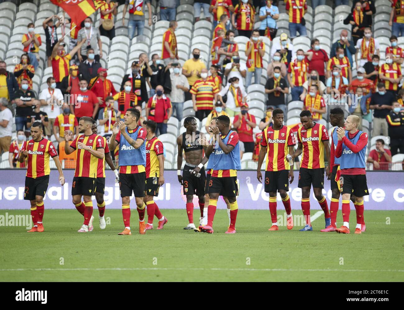 Players of Lens celebrate the victory following the French championship ...