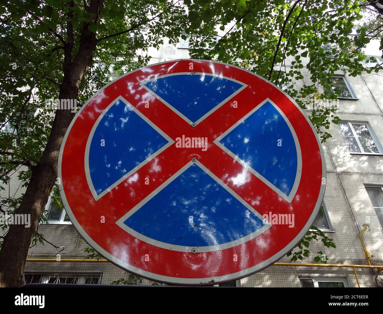 A road sign prohibiting Parking and stopping Stock Photo - Alamy